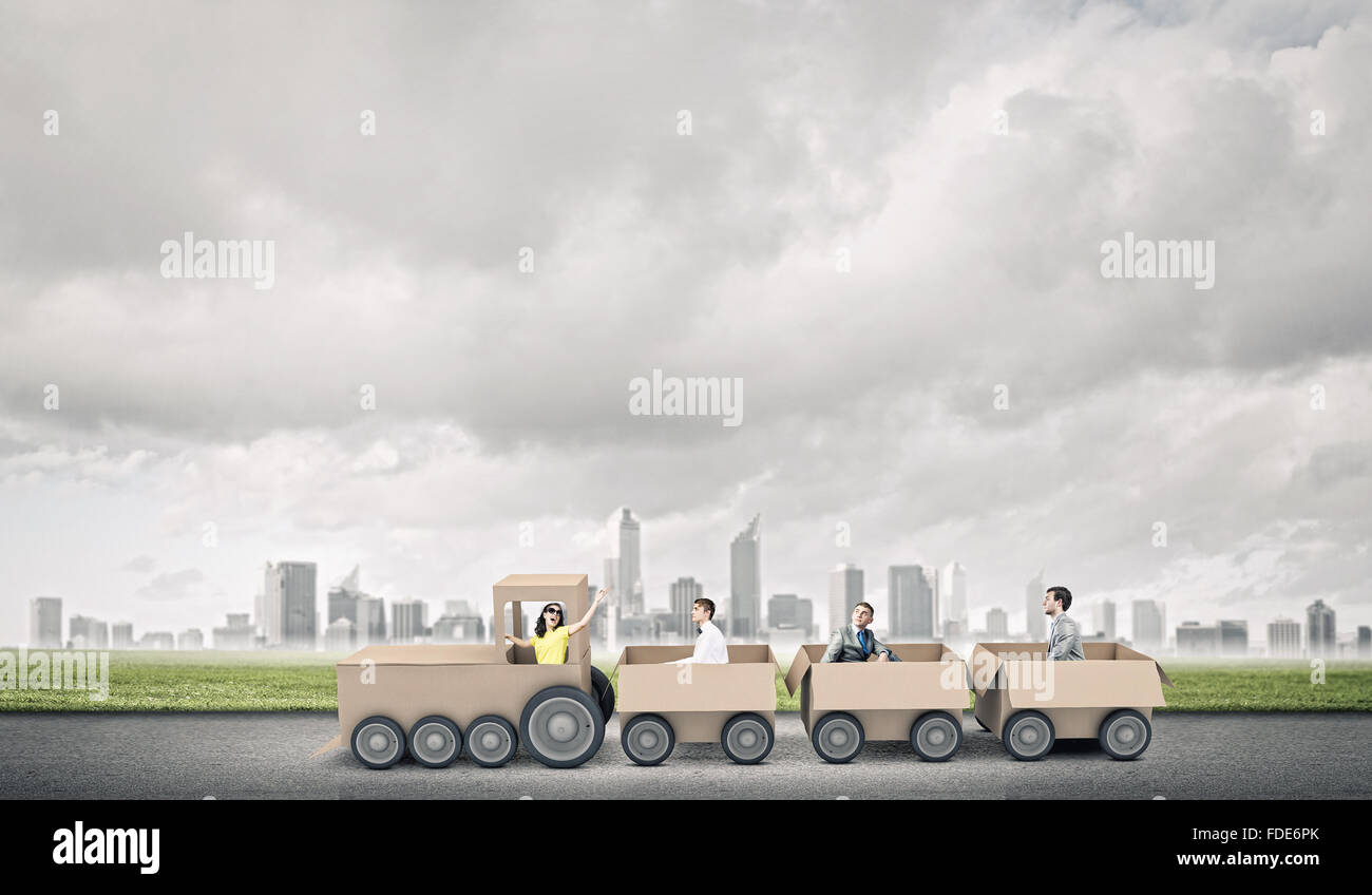 Young business people riding carton train teamwork concept hi-res stock ...