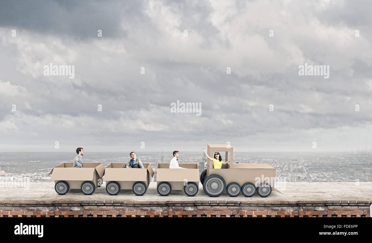 Young business people riding carton train teamwork concept hi-res stock ...