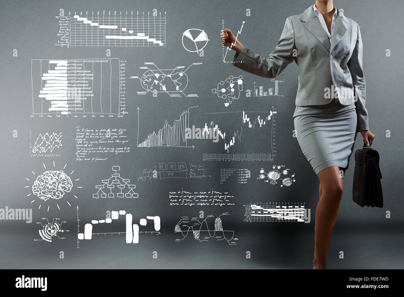 Body of businesswoman drawing business strategy sketches Stock Photo ...