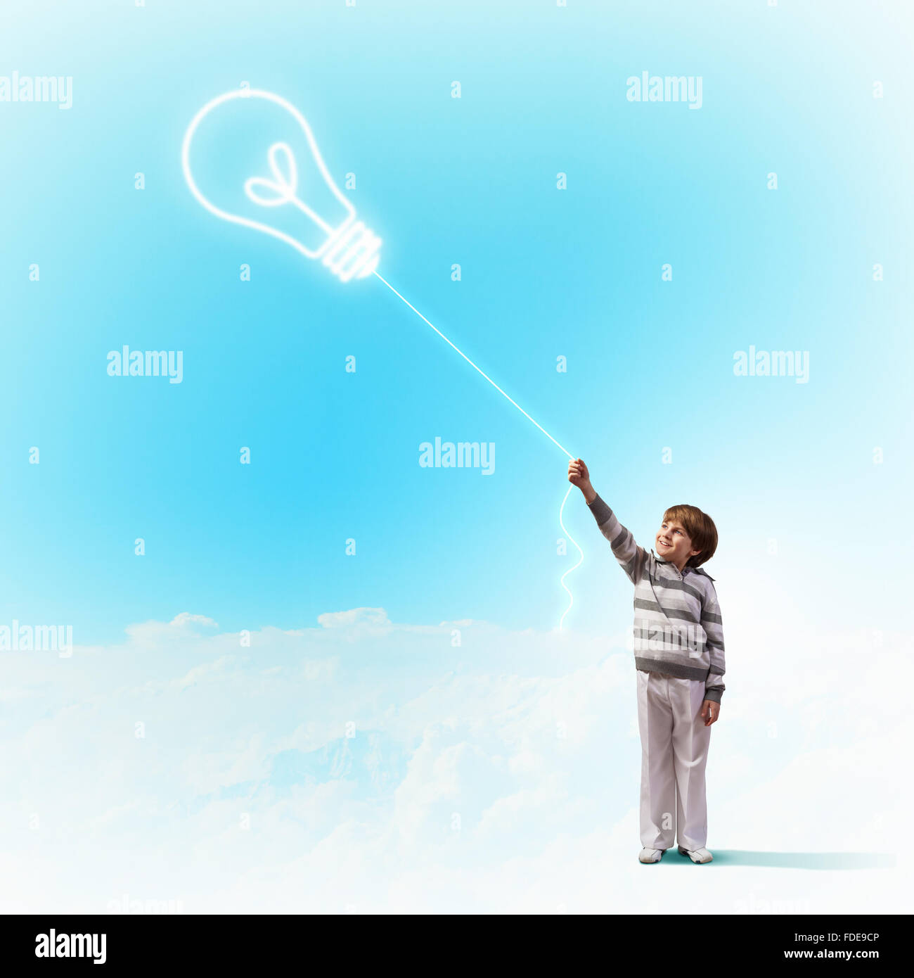 Image of little boy against cloud background. Idea concept Stock Photo ...