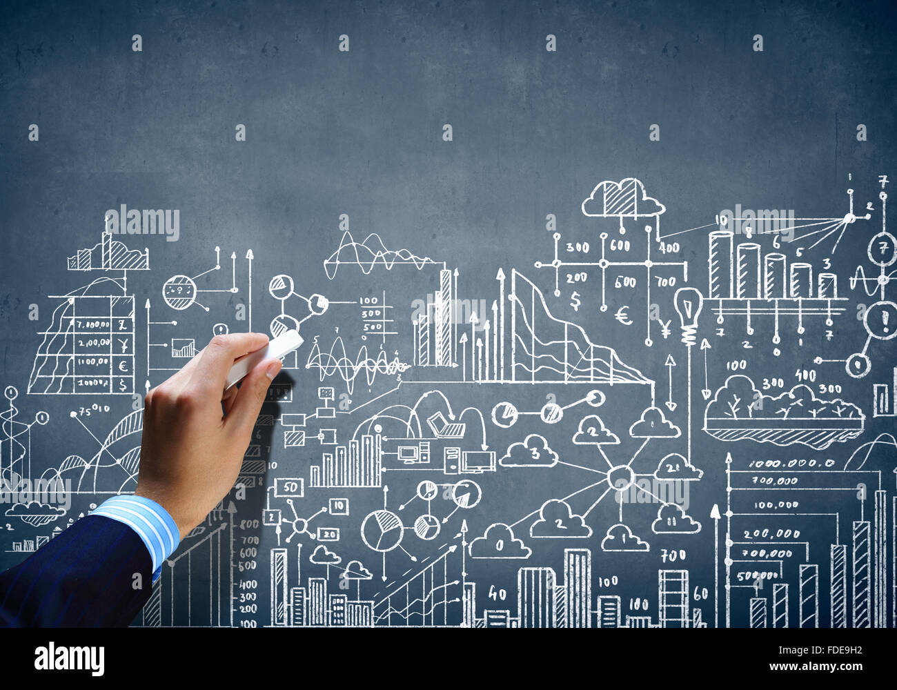 Close up of human hand drawing business plan with chalk Stock Photo - Alamy