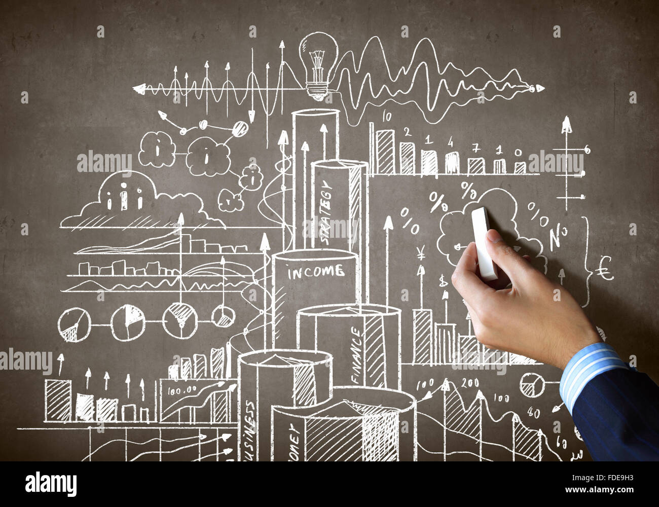 Close up of human hand drawing business plan with chalk Stock Photo - Alamy