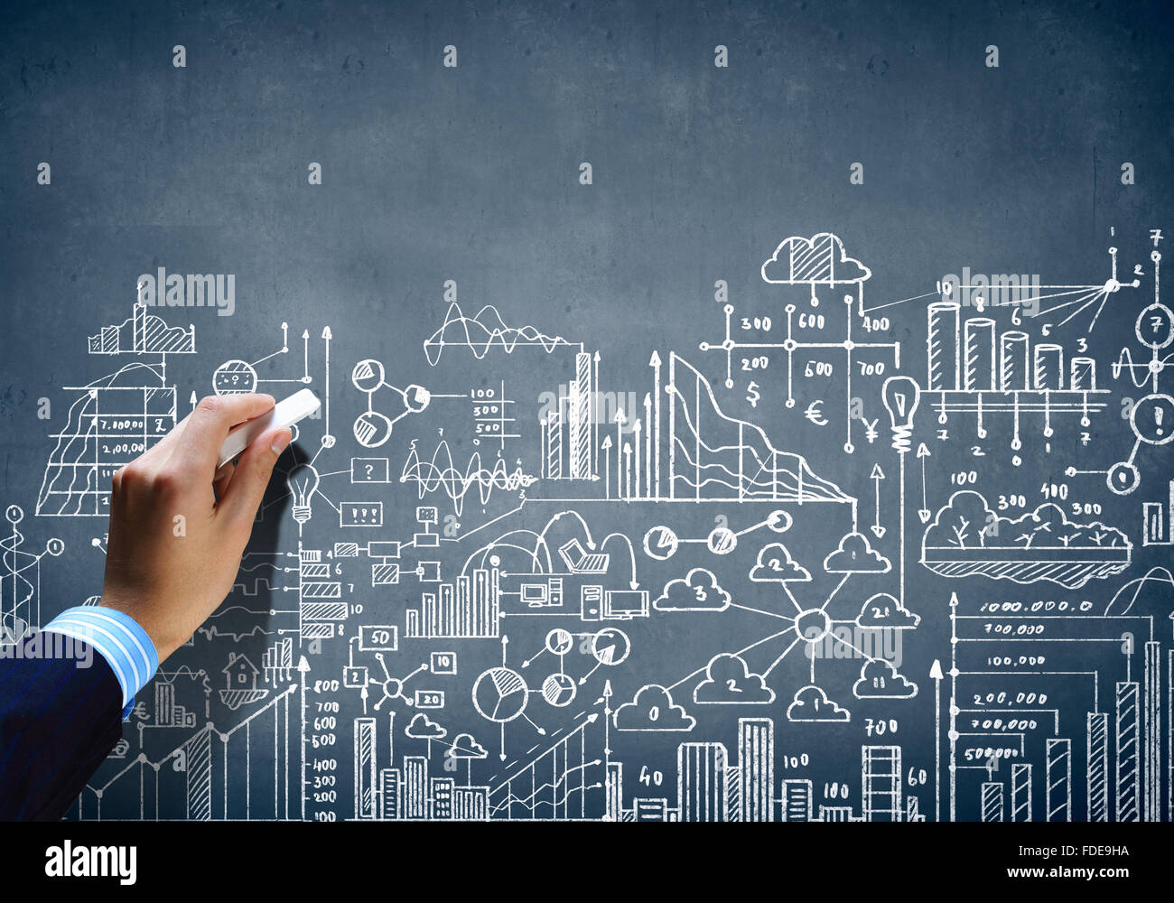 Close up of human hand drawing business plan with chalk Stock Photo - Alamy