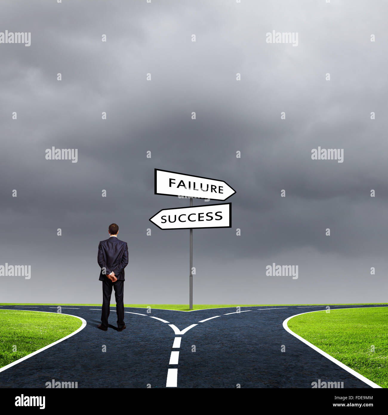 Back view of businessman standing at crossroads. Choice concept Stock ...