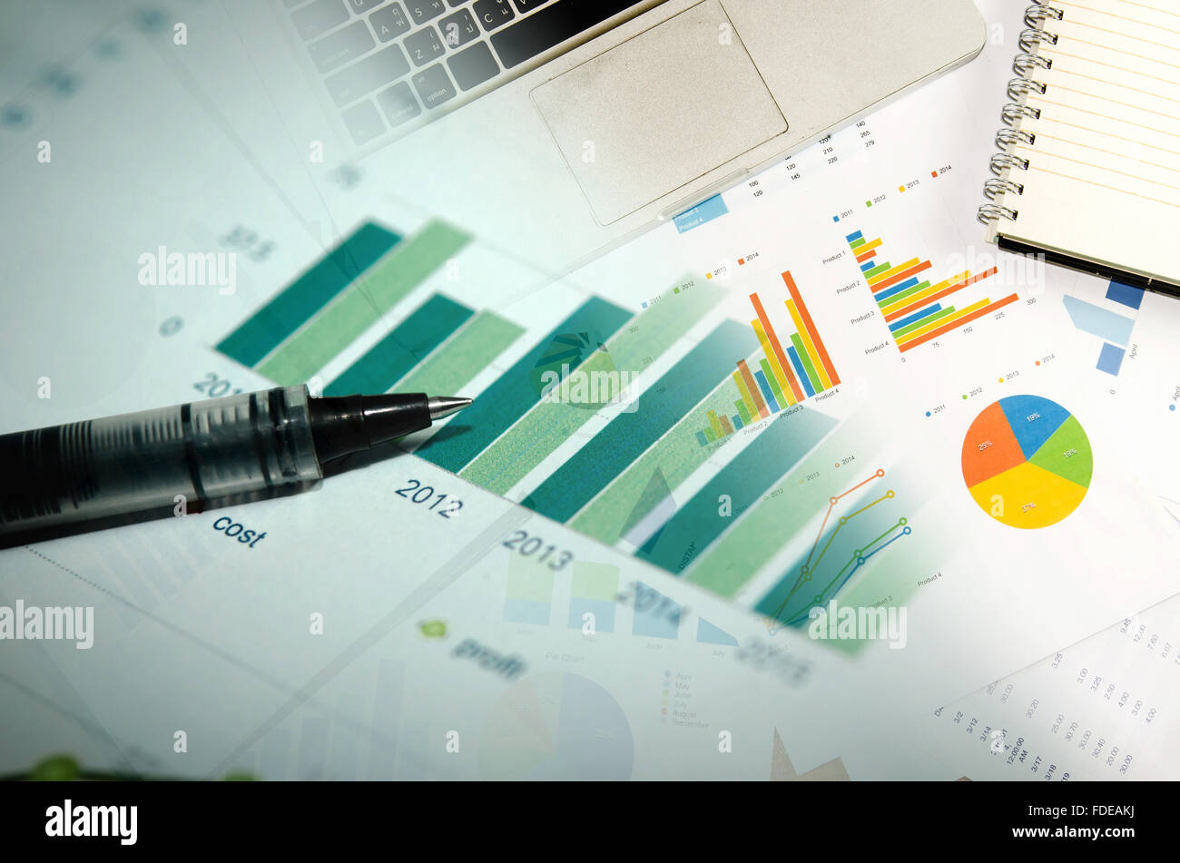 Financial graphs analysis and pen.Business Concept Stock Photo - Alamy