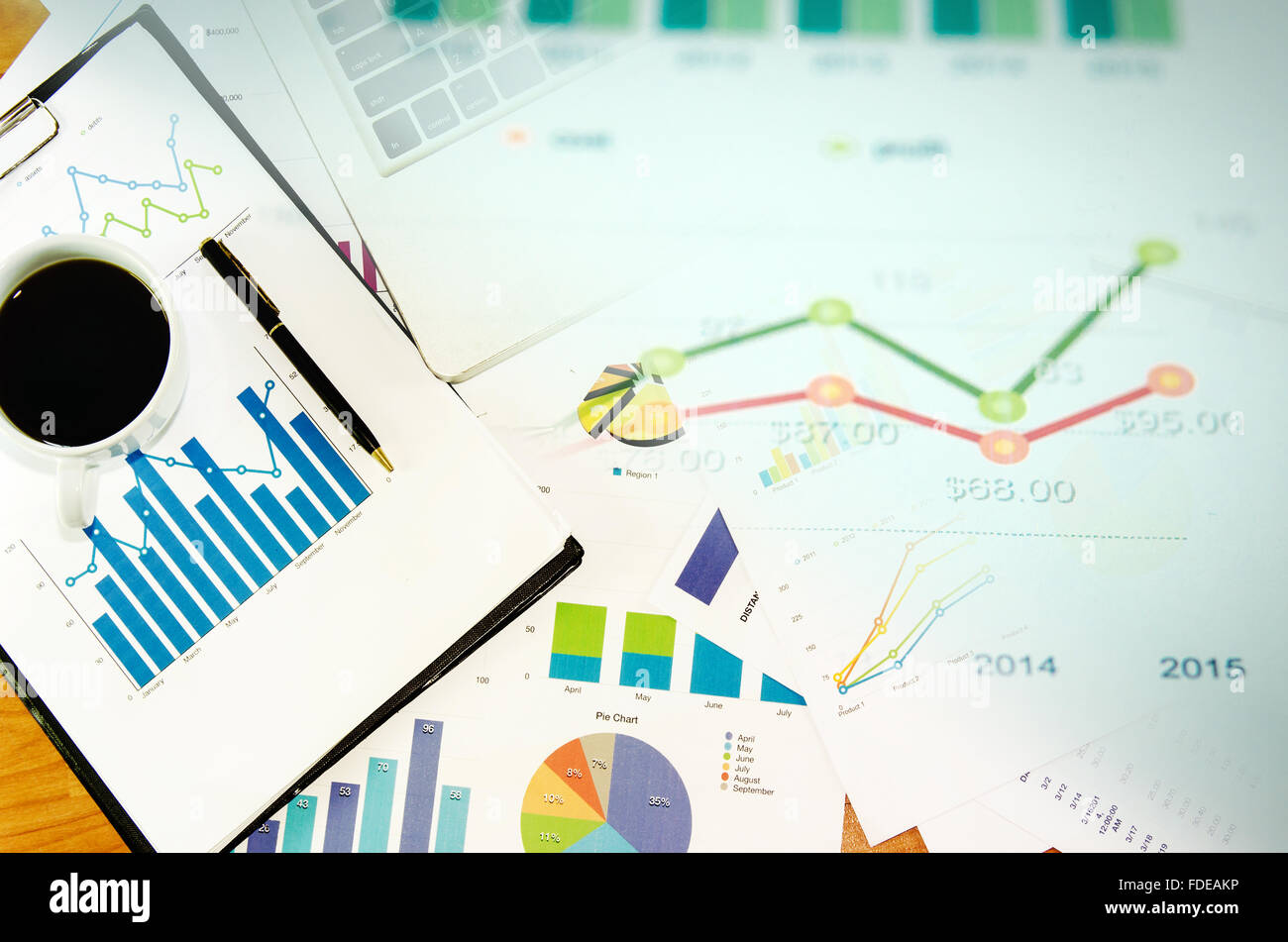 Financial paper charts and graphs on the table.Business Concept Stock ...