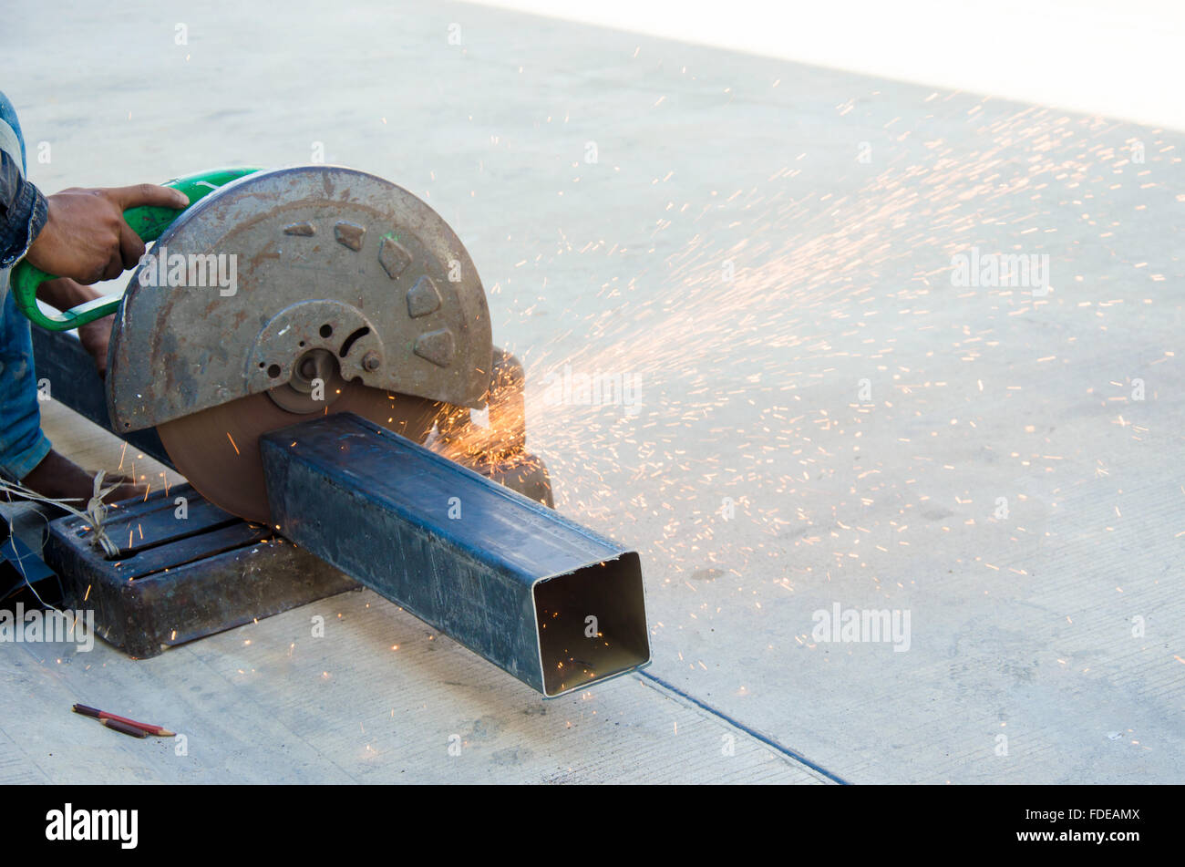 cutting steel rod by machine on a day at the construction site Stock ...