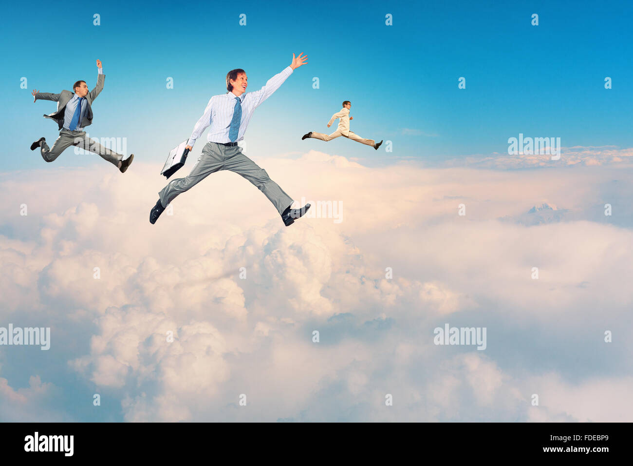 Team excited businesspeople jumping hi-res stock photography and images ...