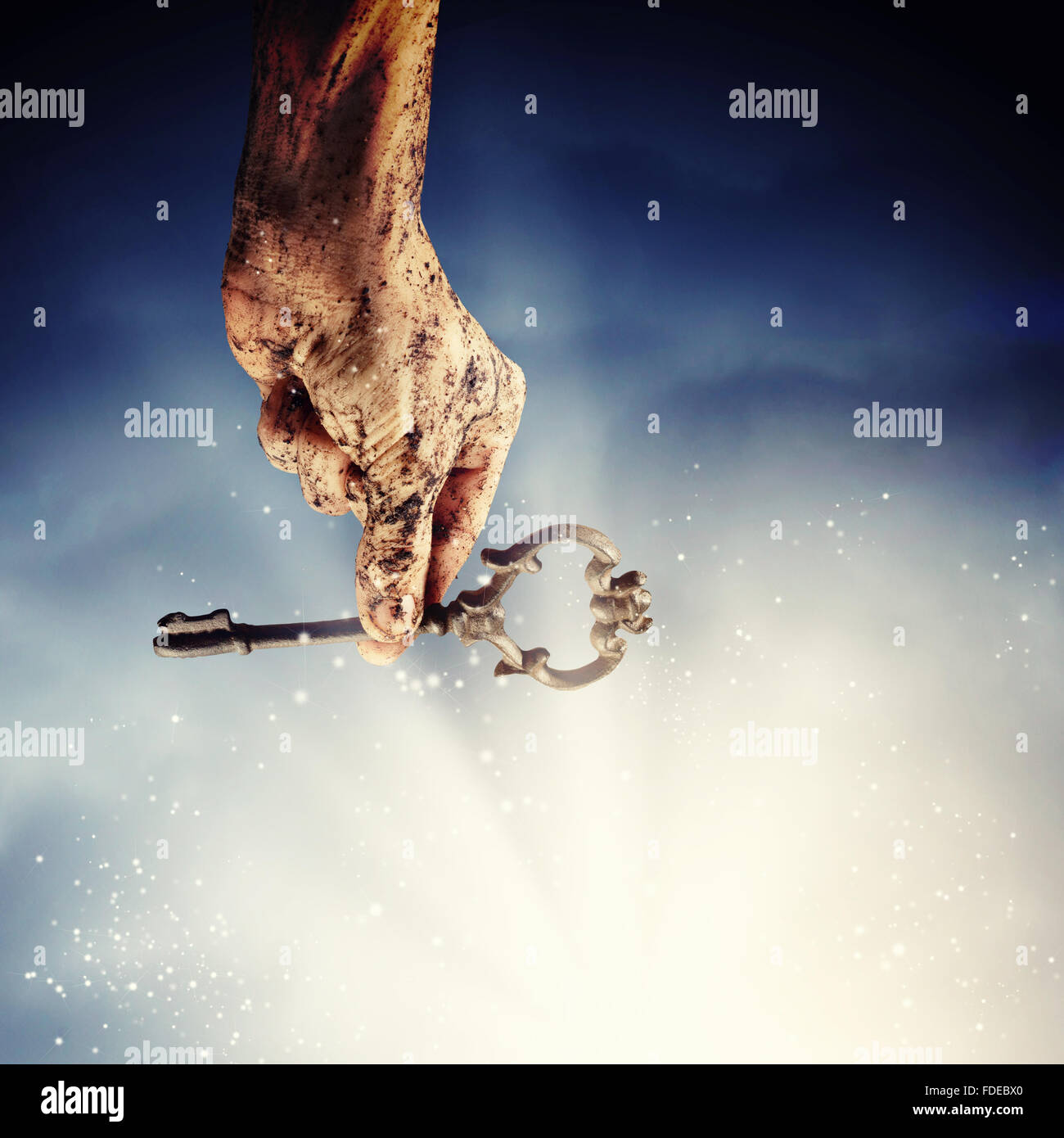 Key in human hand. Struggle and success Stock Photo - Alamy