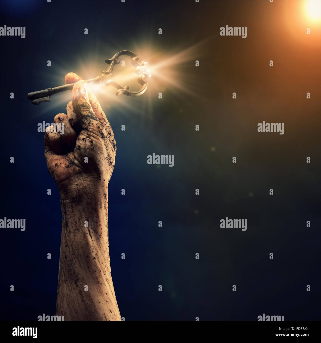 Key in human hand. Struggle and success Stock Photo - Alamy