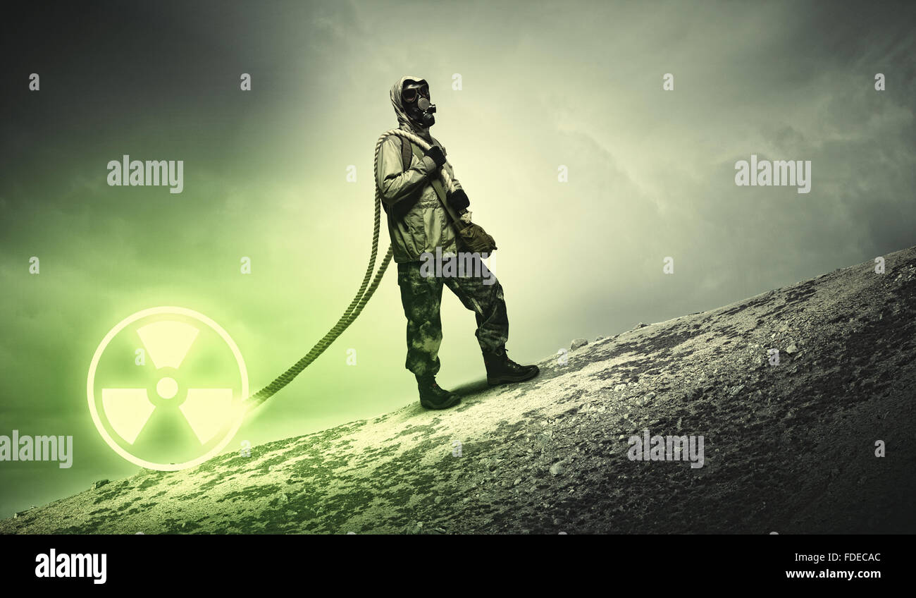 Man in respirator against nuclear background. Radioactivity concept ...