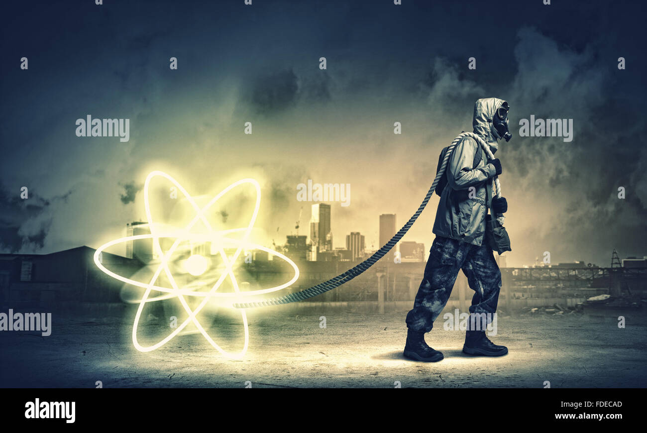 Man in respirator against nuclear background. Radioactivity concept ...