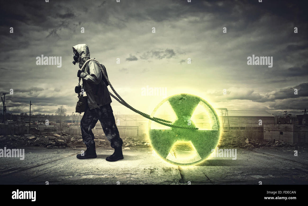 Man in respirator against nuclear background. Radioactivity concept ...