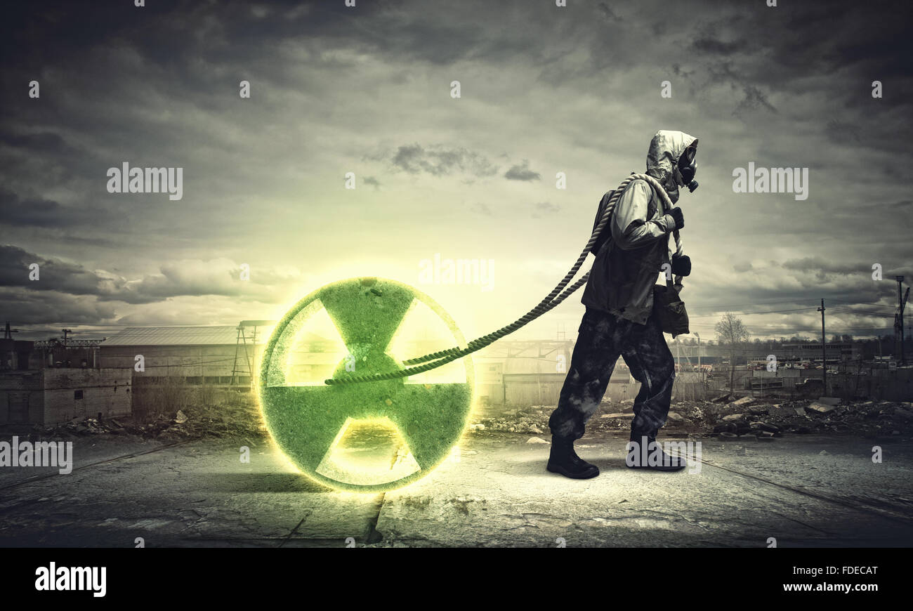 Man in respirator against nuclear background. Radioactivity concept ...