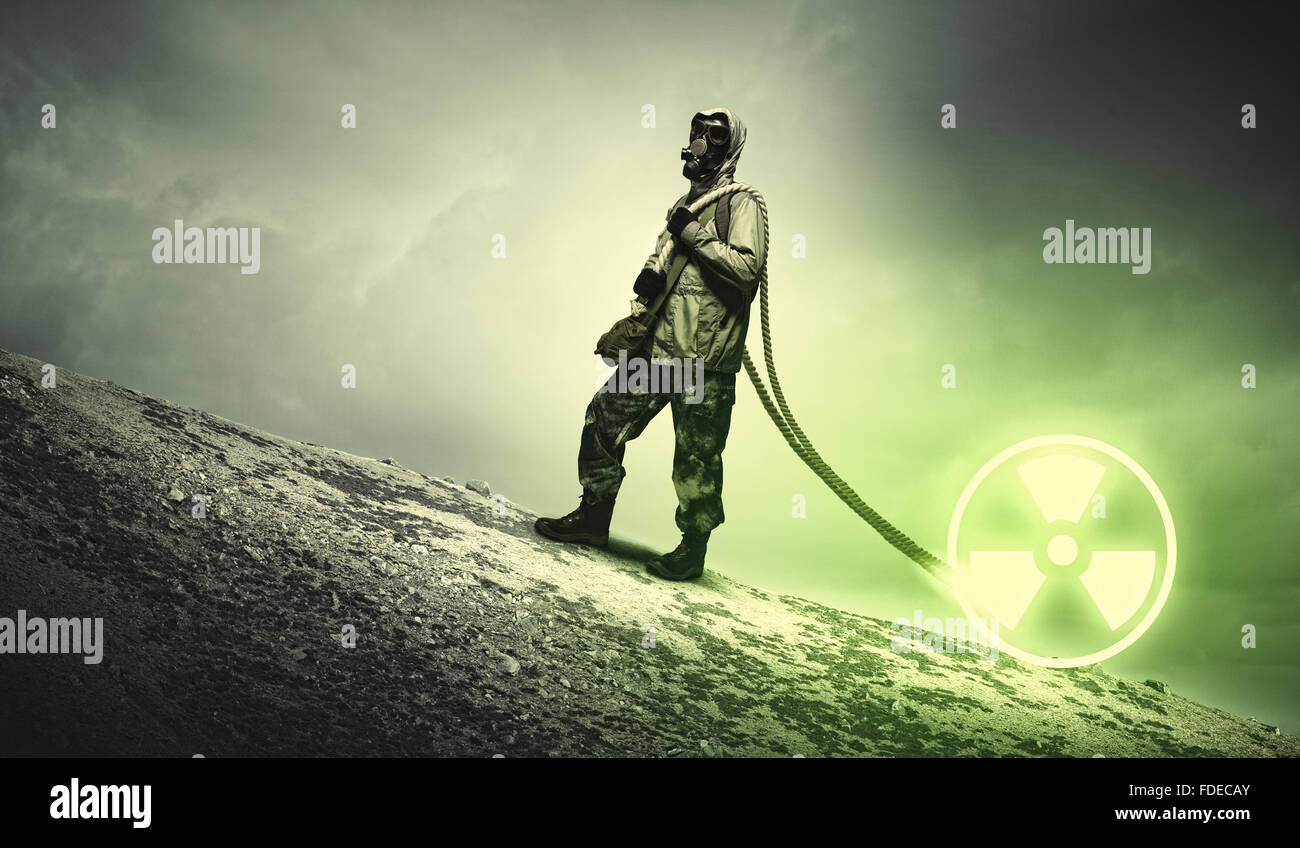 Man in respirator against nuclear background. Radioactivity concept ...