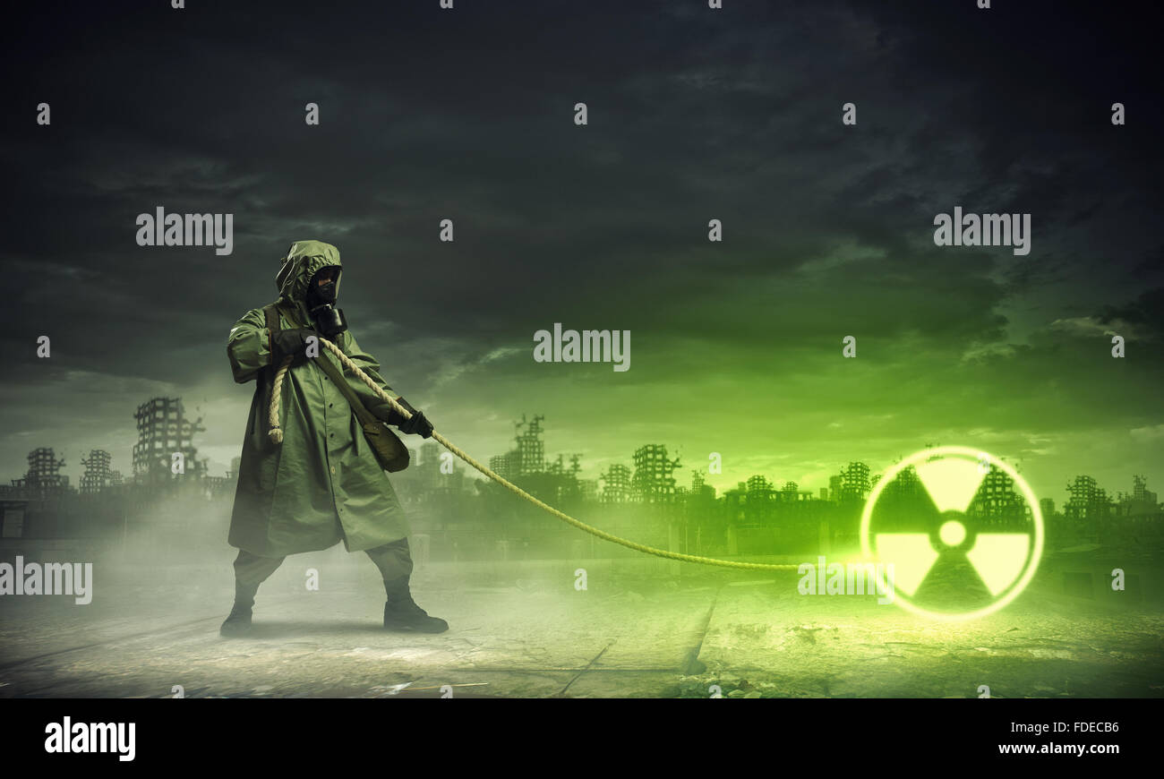 Man in respirator against nuclear background. Radioactivity concept ...