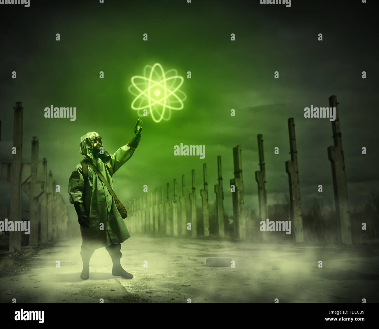Man in respirator against nuclear background. Radioactivity concept ...