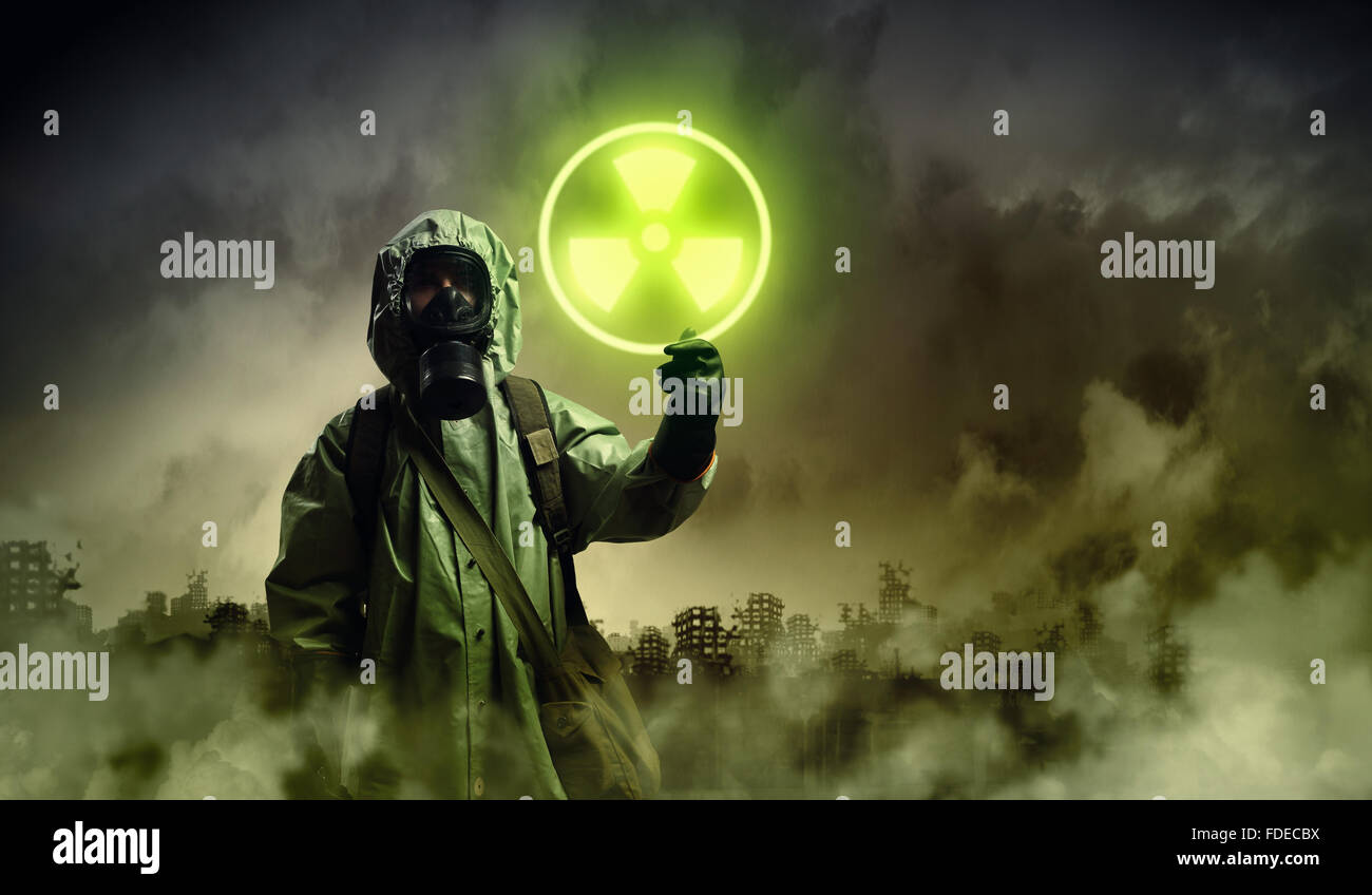 Man in respirator against nuclear background. Radioactivity concept ...
