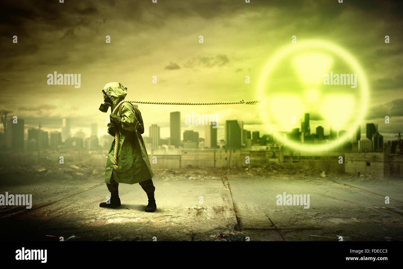 Man in respirator against nuclear background. Radioactivity concept ...