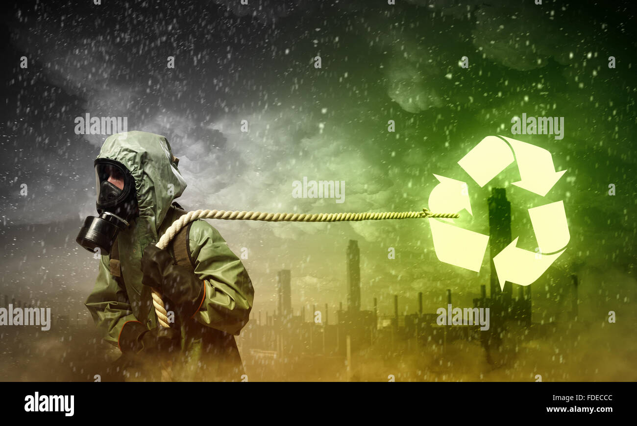 Man in respirator against nuclear background. Recycle concept Stock ...
