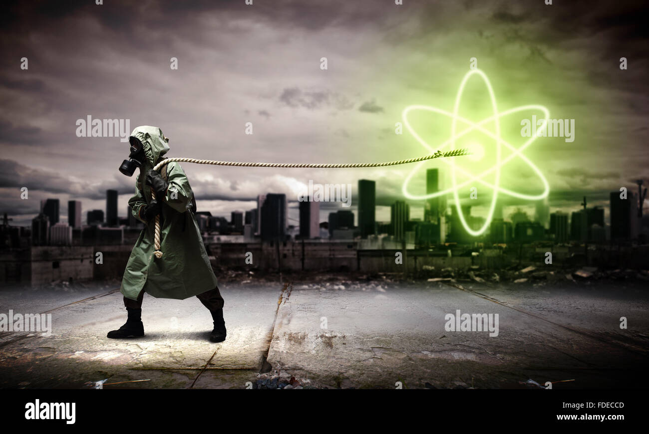 Man in respirator against nuclear background. Radioactivity concept ...