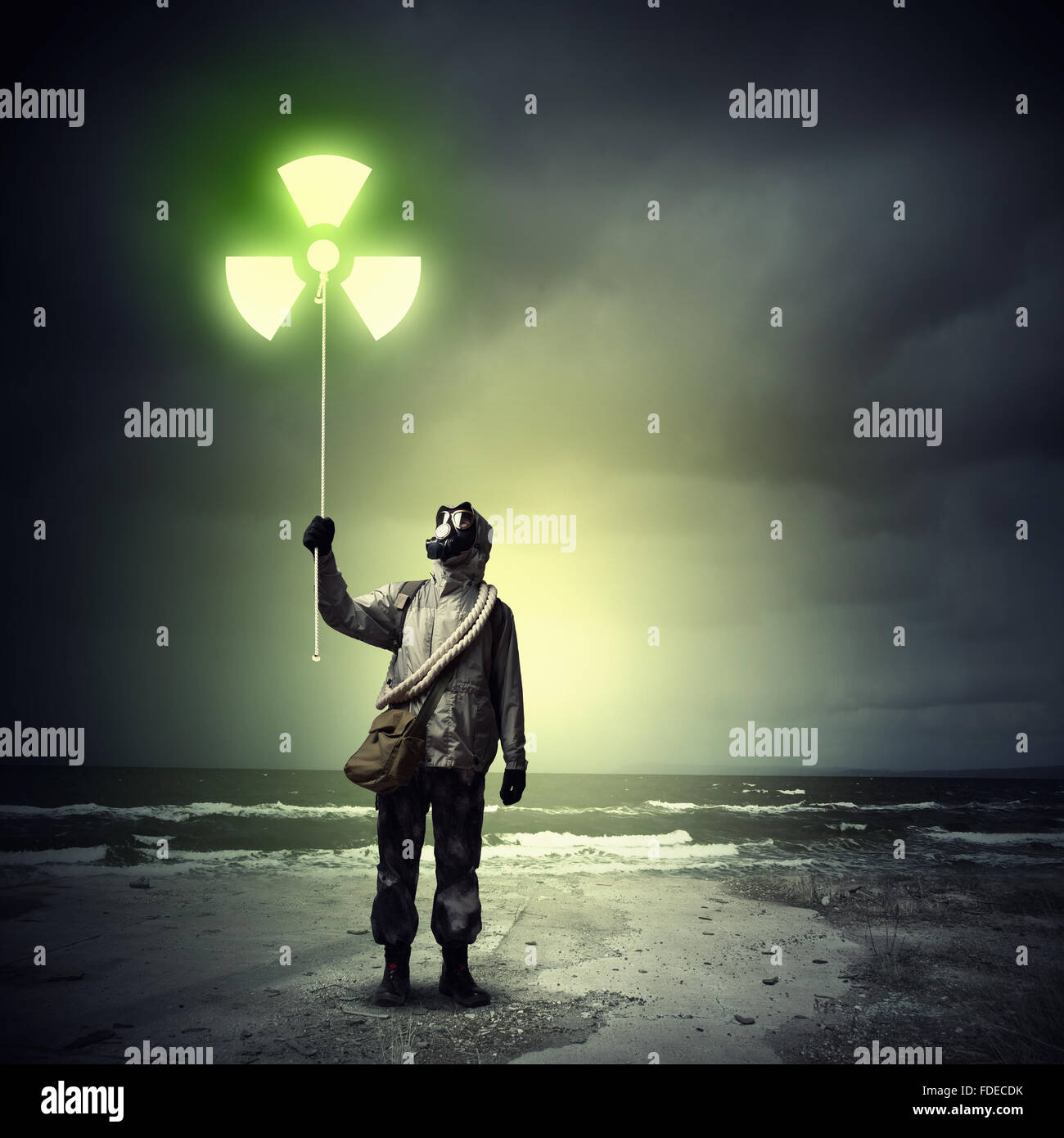 Man in respirator against nuclear background. Radioactivity concept ...