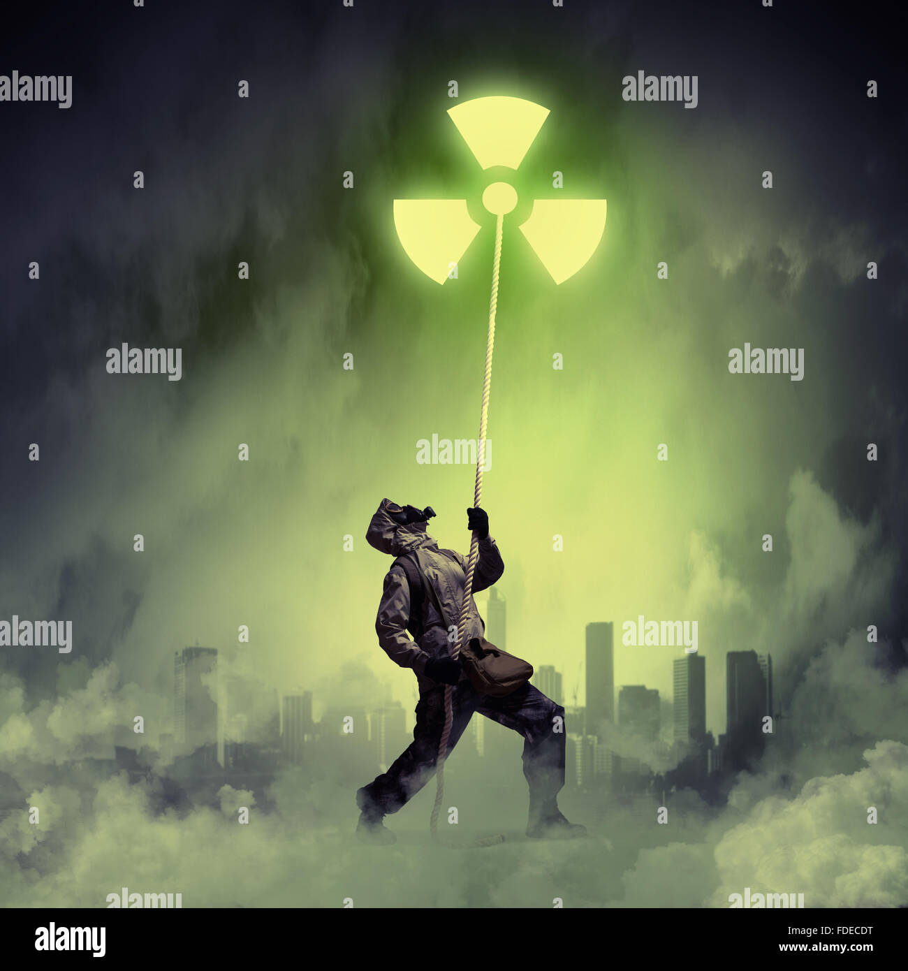 Man in respirator against nuclear background. Radioactivity concept ...