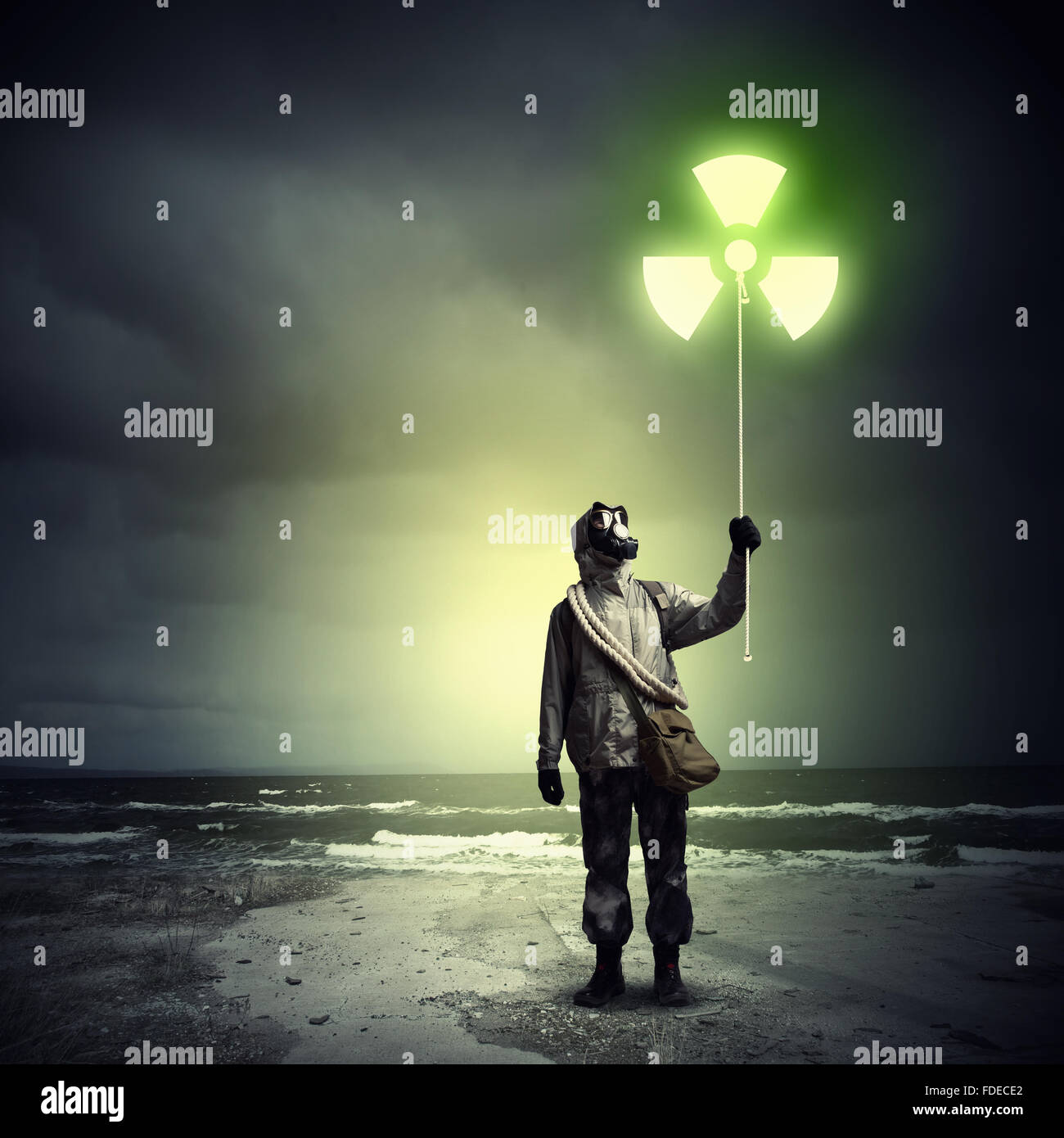 Man in respirator against nuclear background. Radioactivity concept ...