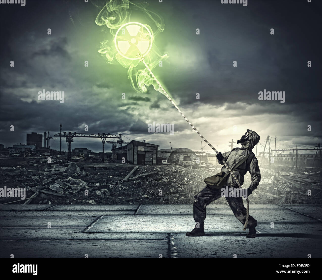 Man in respirator against nuclear background. Radioactivity concept ...