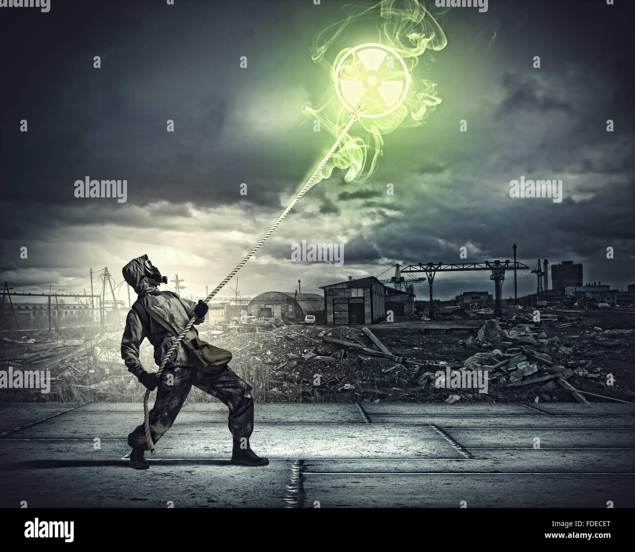 Man in respirator against nuclear background. Radioactivity concept ...