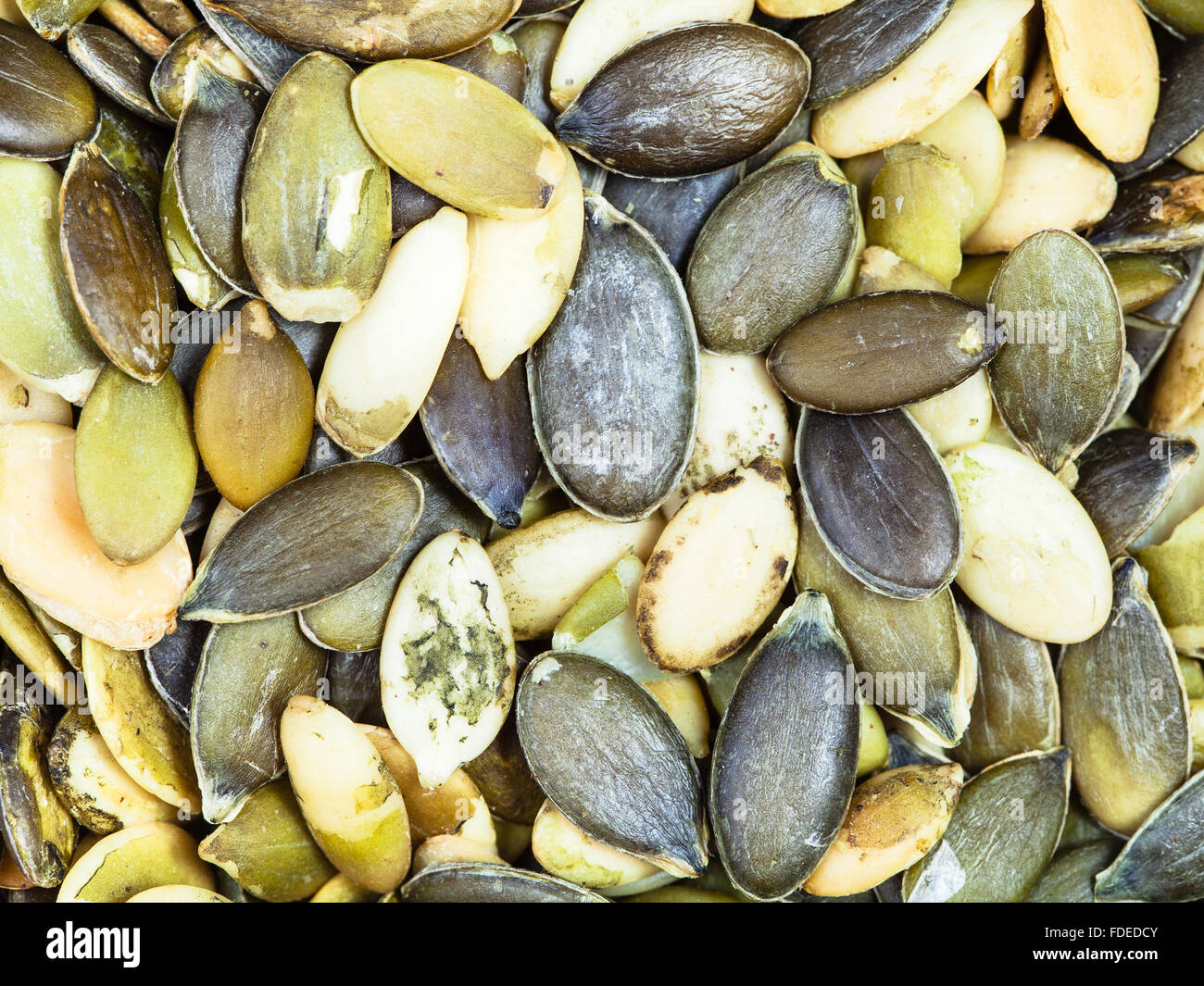 food background - many green peeled pumpkin seeds Stock Photo - Alamy