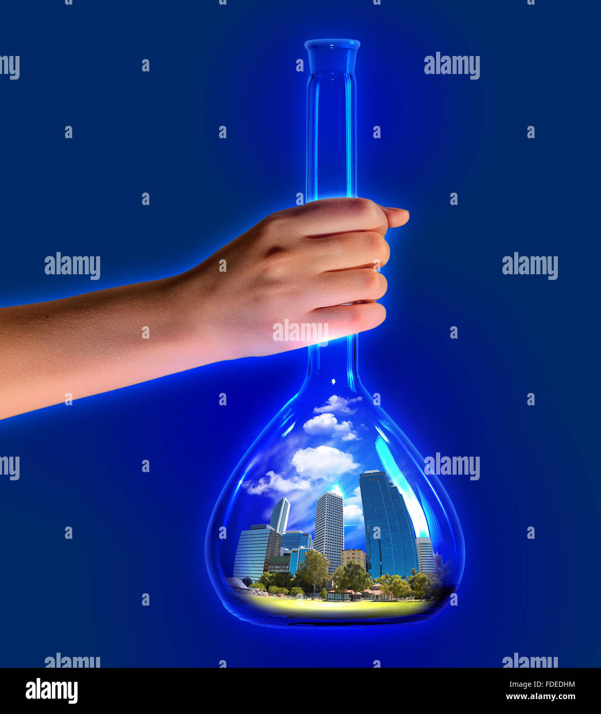 Close up of human hand holding test tube. Ecology concept Stock Photo ...