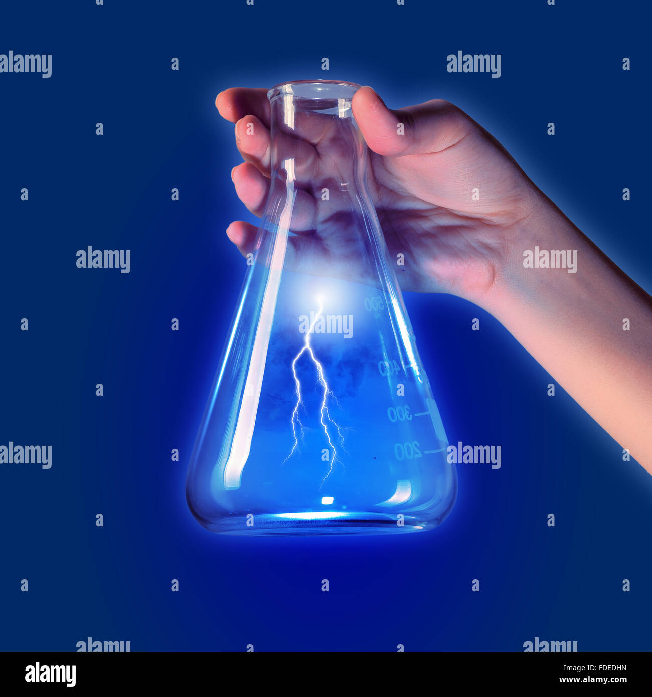 Close up image of human hand holding test tube with lightning Stock ...