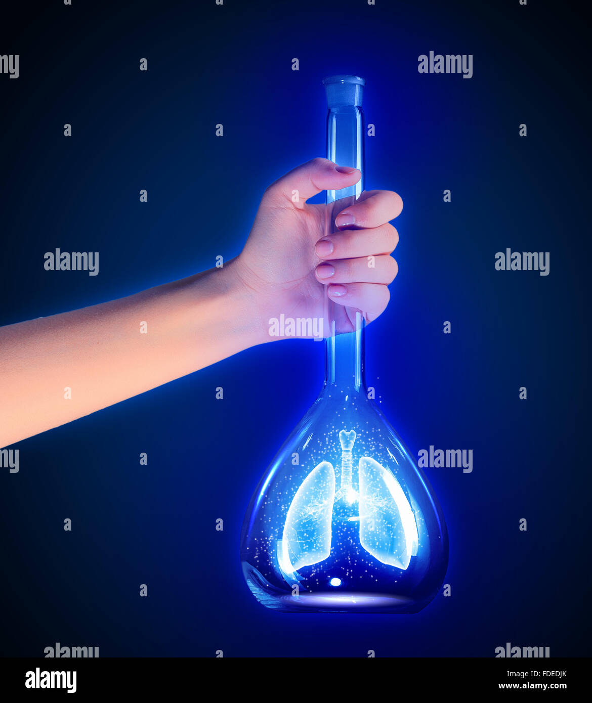 Human hand holding test tube with lungs Stock Photo - Alamy