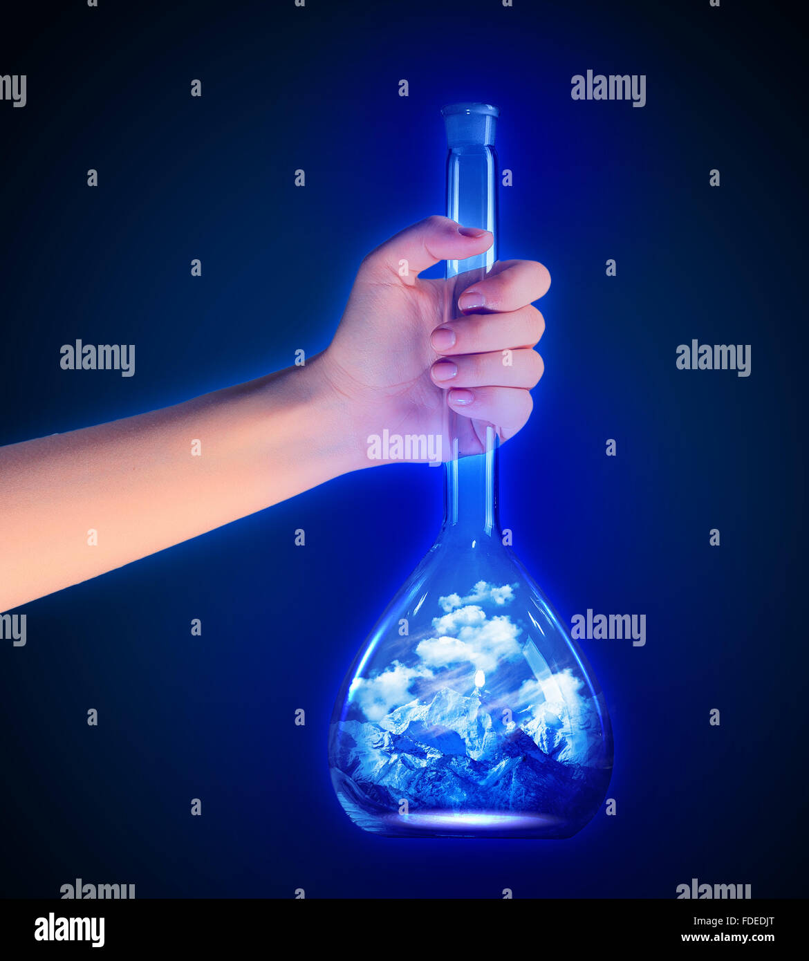 Close up image of human hand with test tube Stock Photo - Alamy