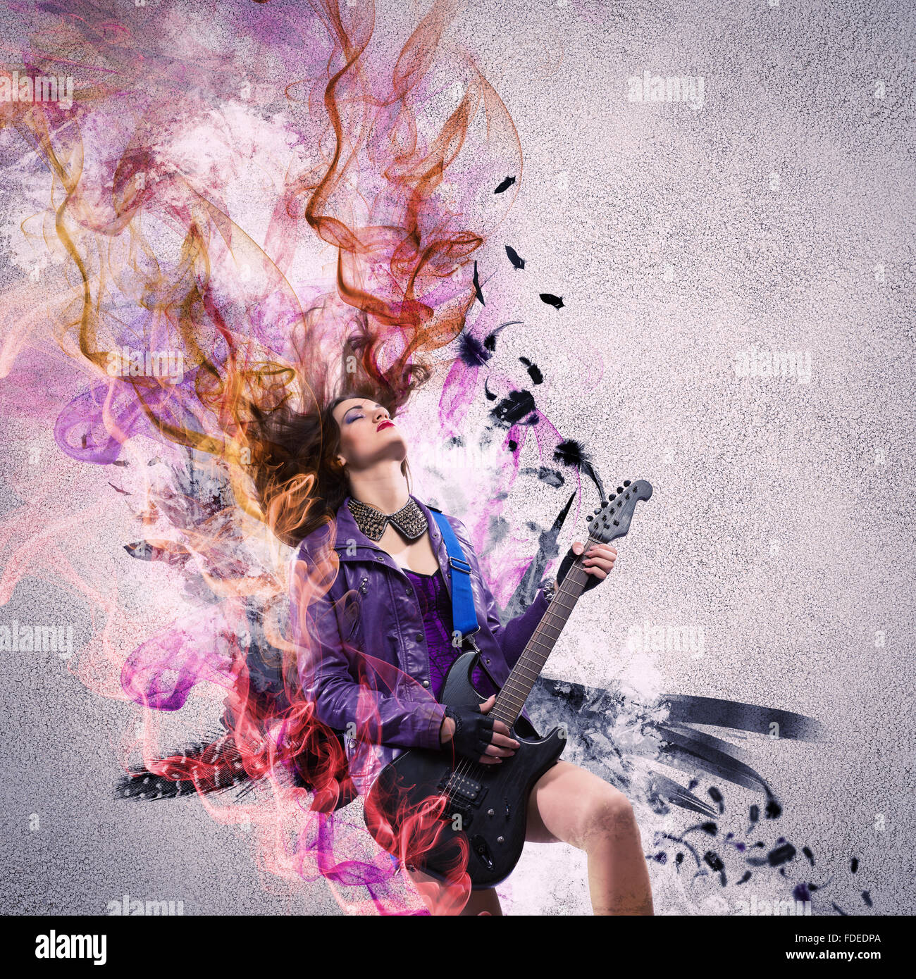 Young attractive rock girl playing the electric guitar Stock Photo - Alamy