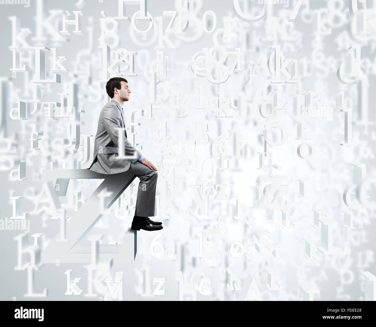 Young businessman sitting on huge white letter. Email concept Stock ...