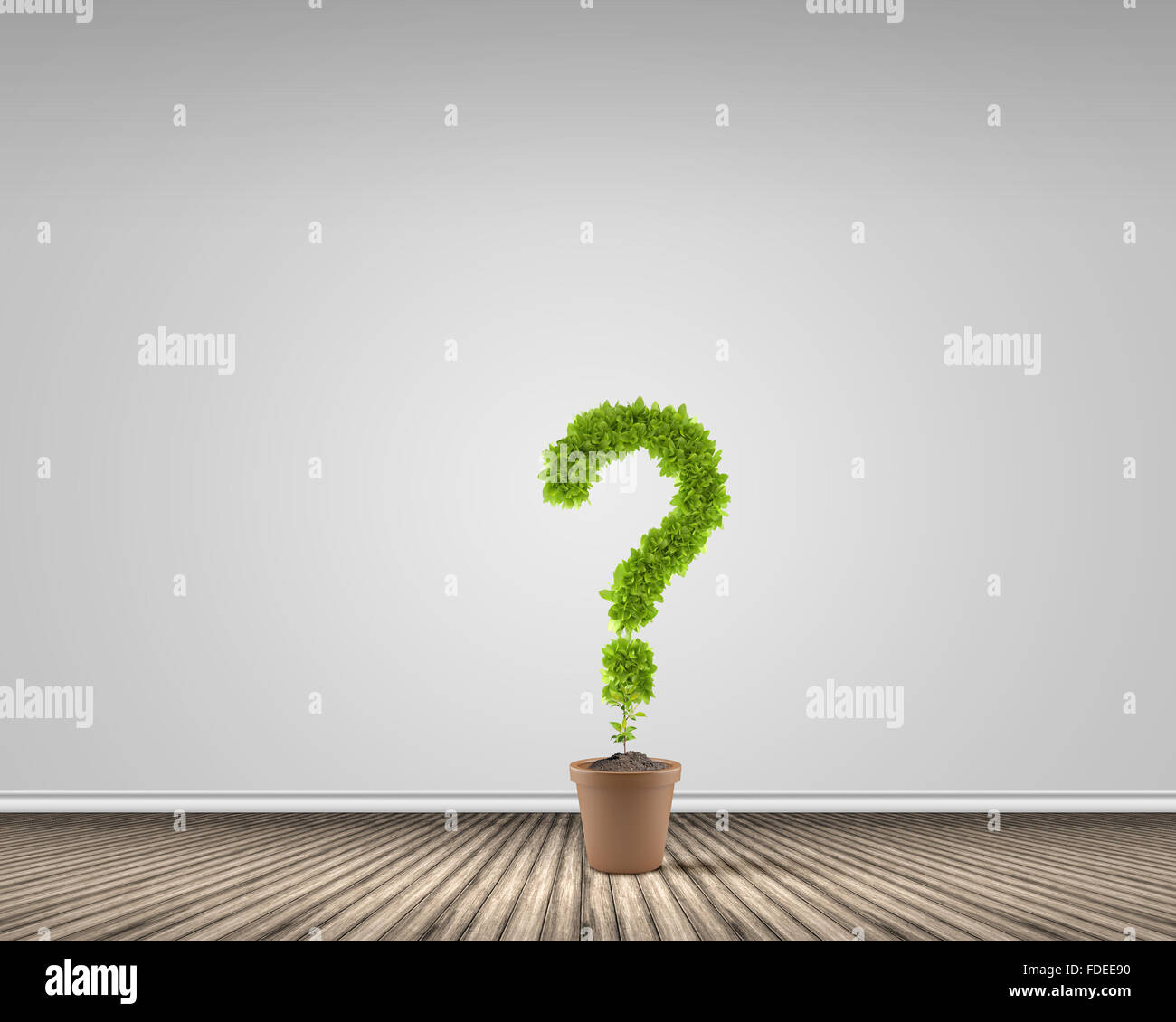 Conceptual image of plant in pot shaped like question mark Stock Photo ...
