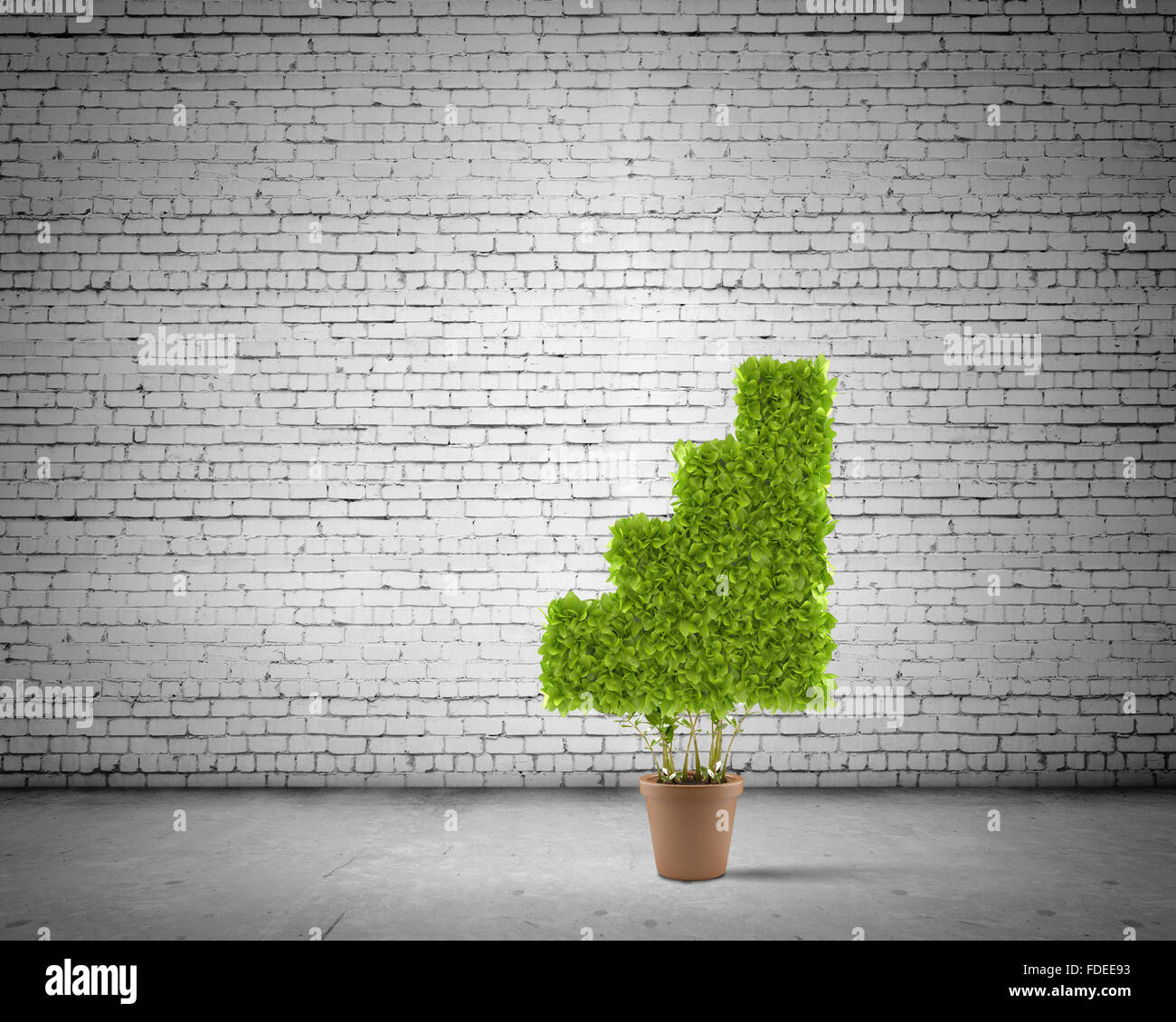 Conceptual image of plant in pot shaped like graph Stock Photo - Alamy
