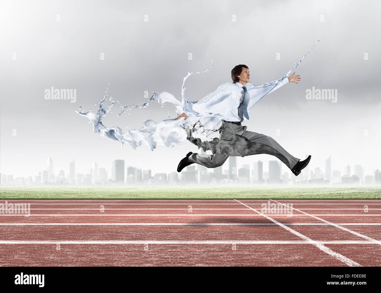 Funny young office worker running in a hurry Stock Photo - Alamy