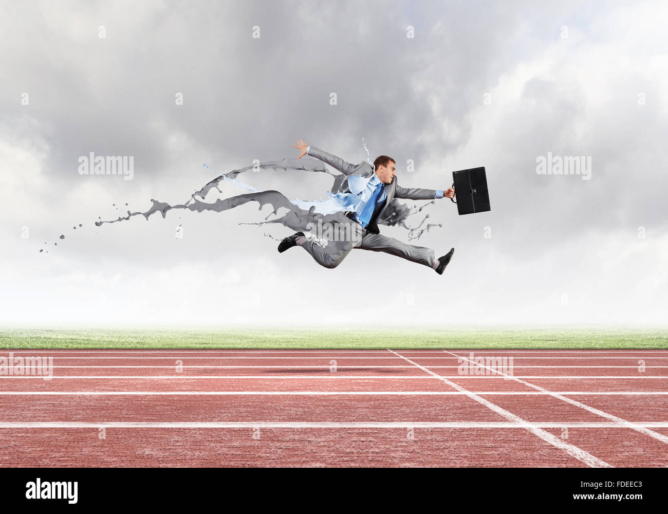 Funny young office worker running in a hurry Stock Photo - Alamy
