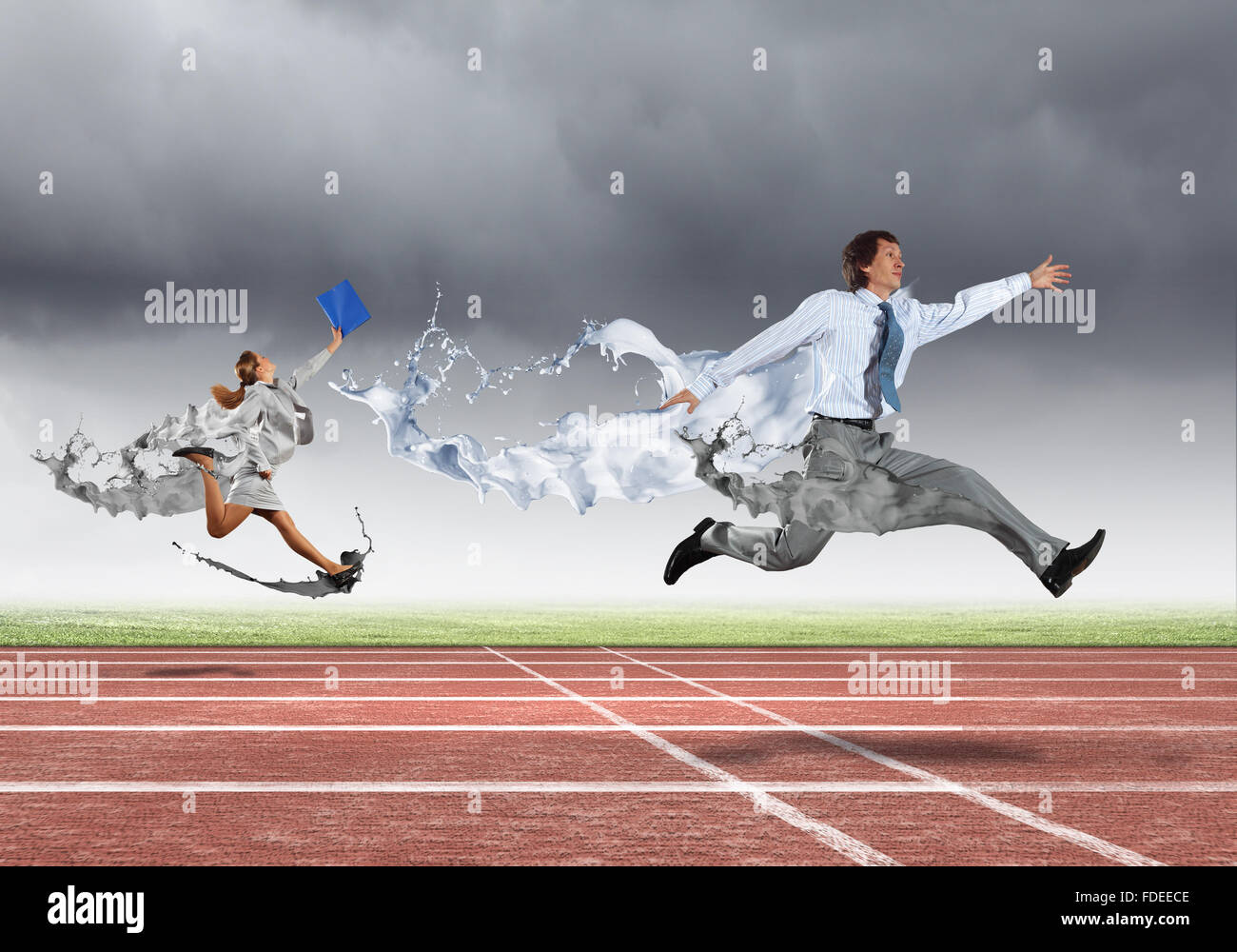 Funny image of young businesspeople running at stadium Stock Photo - Alamy