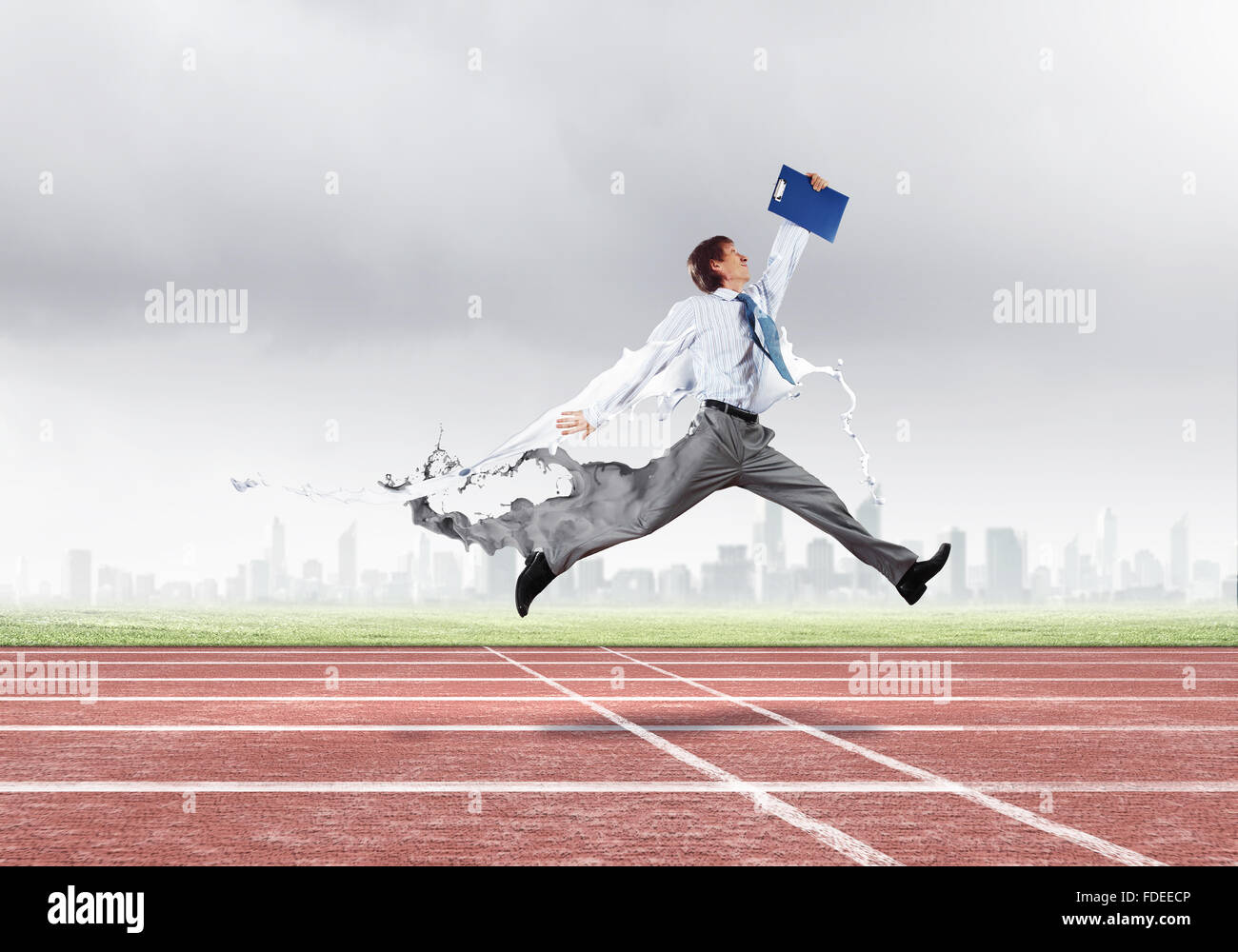 Funny young office worker running in a hurry Stock Photo - Alamy