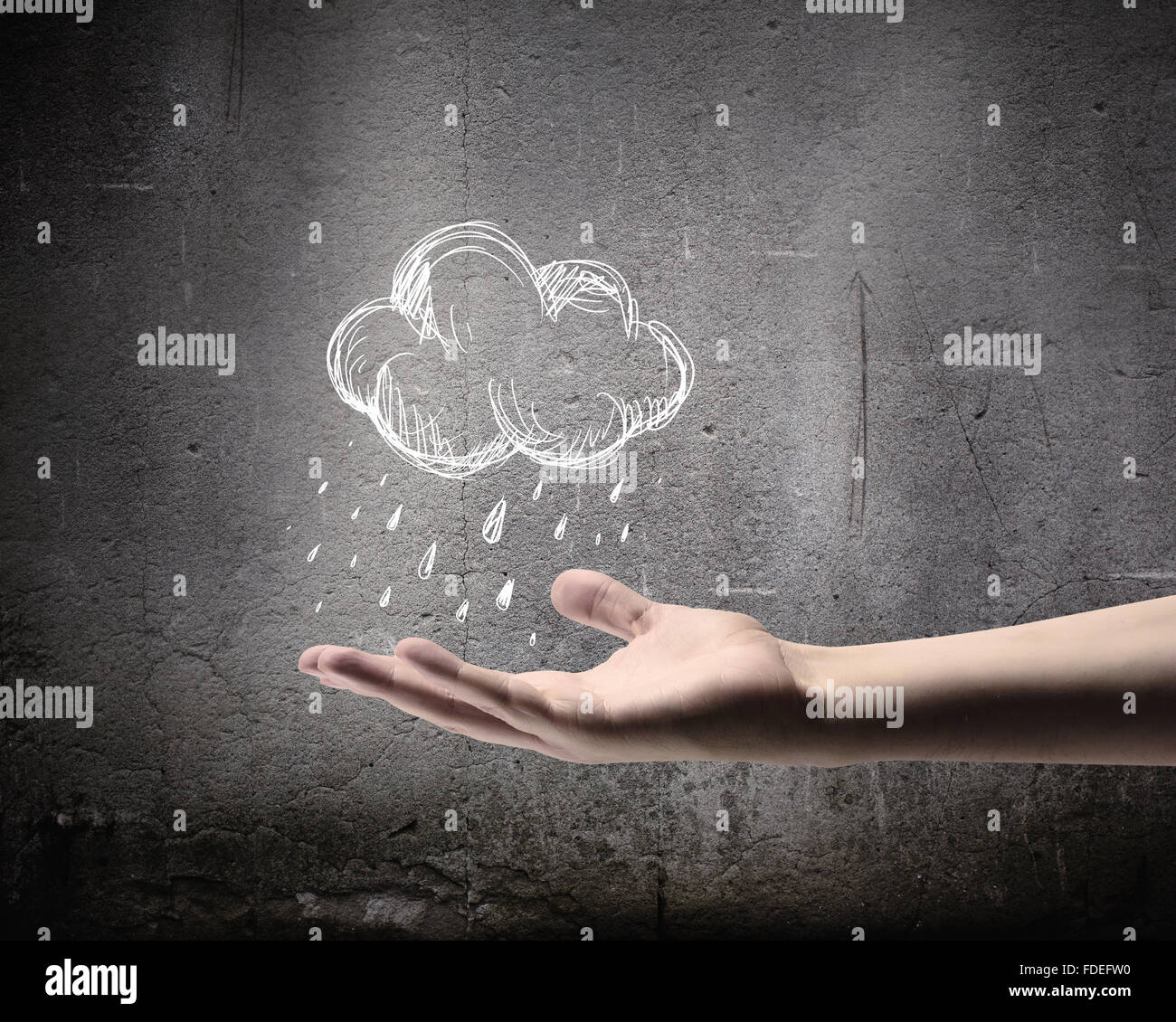 Background conceptual image with raining cloud in hand Stock Photo - Alamy