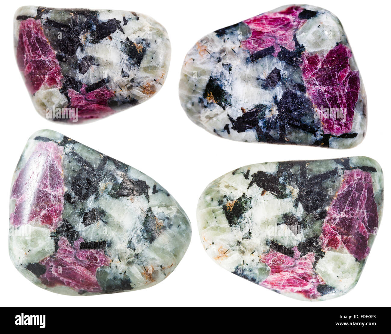 natural mineral gem stones - tumbled corundum crystals in rocks ...