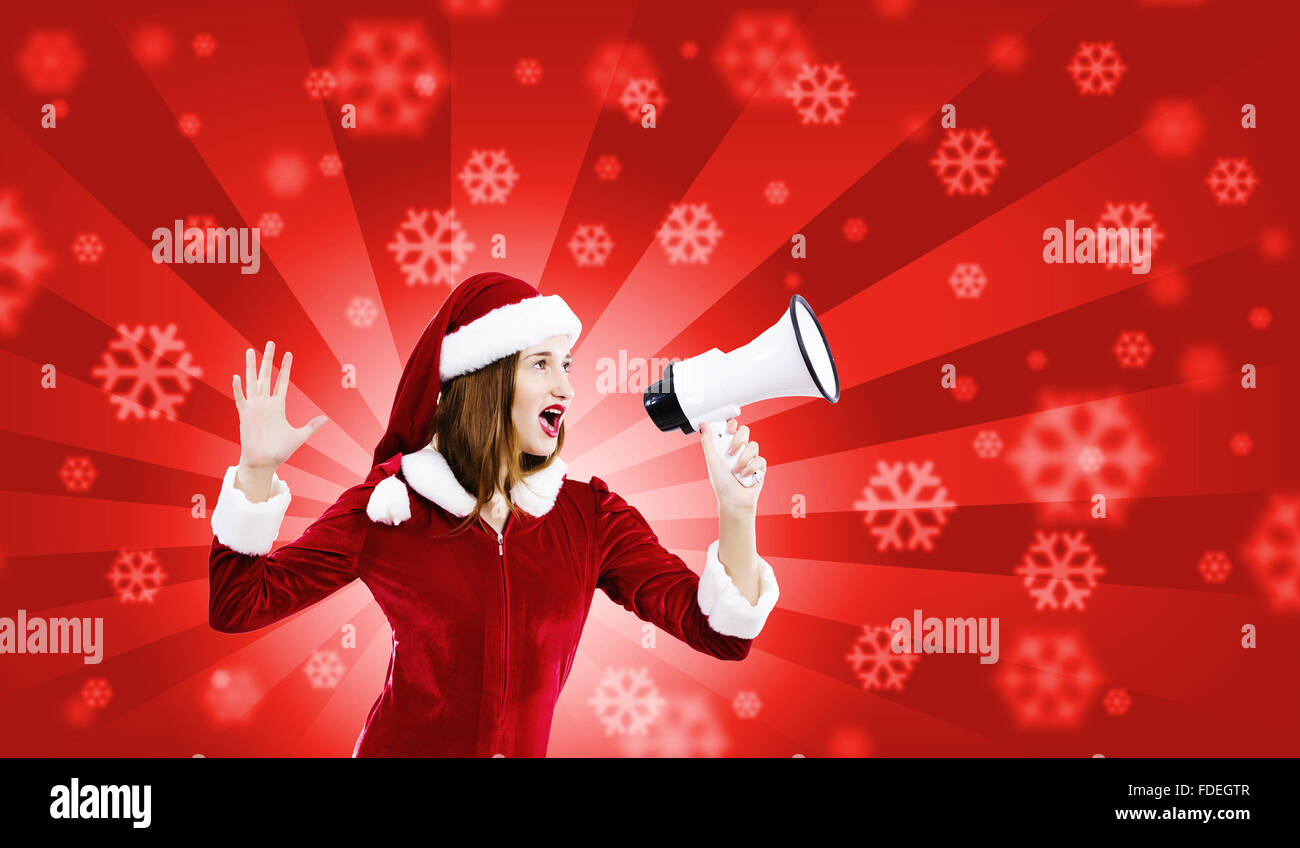Young attractive Santa girl listening music in headphones Stock Photo ...