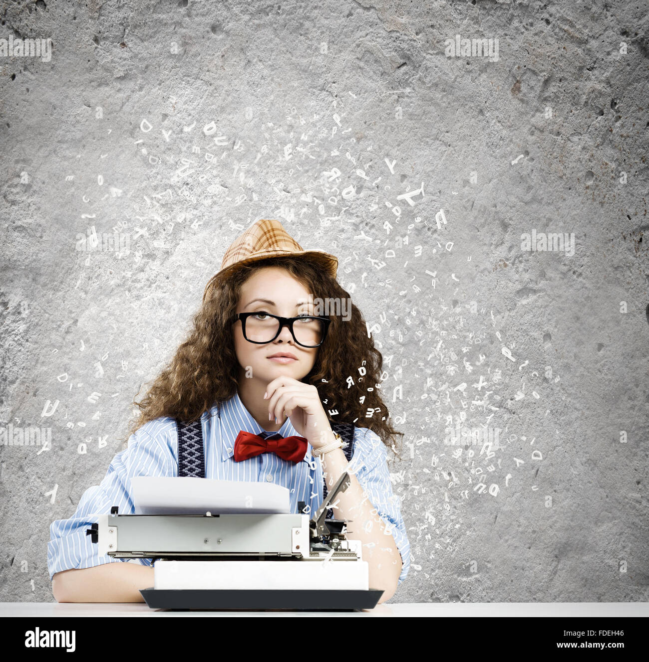 Young funny woman in glasses using typewriter Stock Photo - Alamy