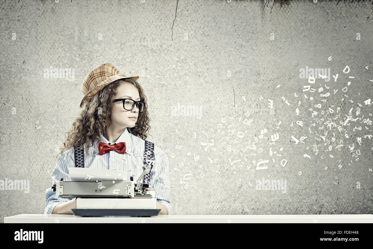 Young funny woman in glasses using typewriter Stock Photo - Alamy