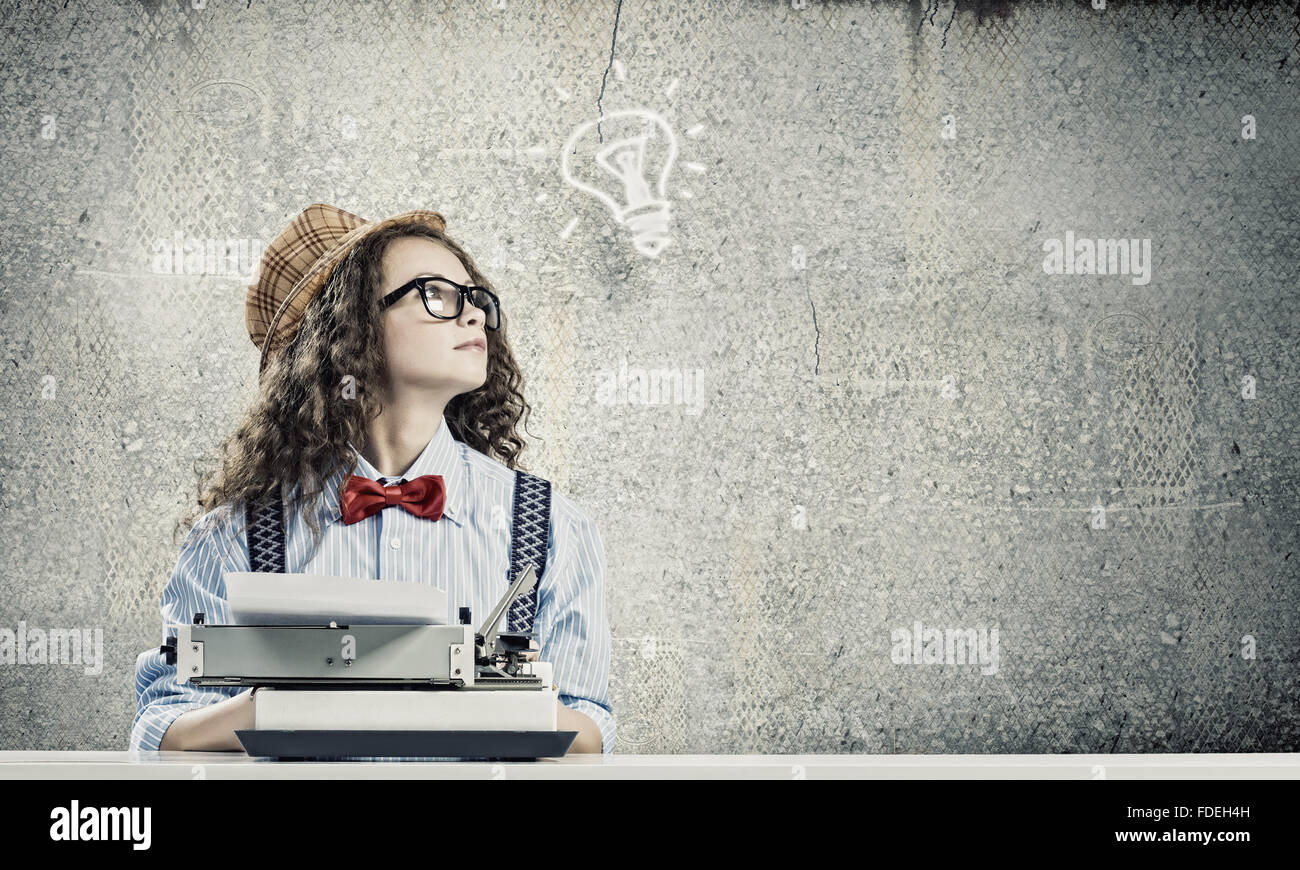 Young funny woman in glasses using typewriter Stock Photo - Alamy