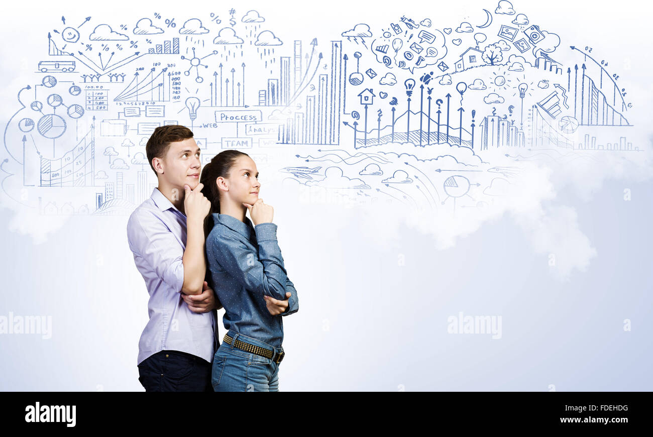 Conceptual image of young couple hugging each other and dreaming Stock ...